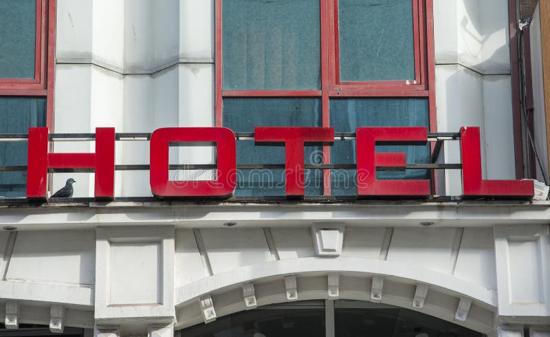 Hotel Sign on the Wall in the City. Stock Image - Image of letter ...