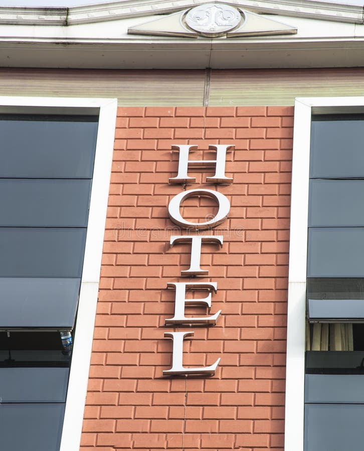 Hotel Sign on the Wall in the City. Stock Image - Image of break, city ...