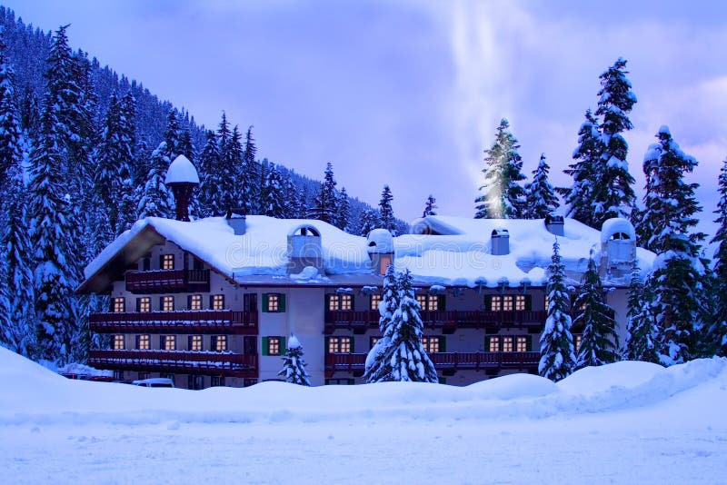 Hotel in snow stock photo. Image of evening, windows, warm - 3930890