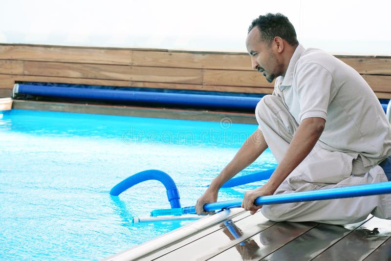Hotel Staff Worker Cleaning the Pool. Maintenance. Stock Photo - Image ...