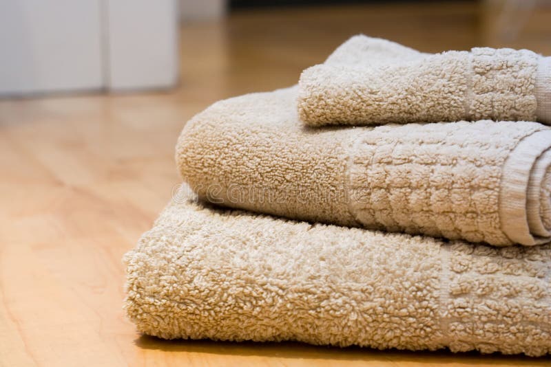Hotel style towels stock image. Image of wood, toweling - 4422091