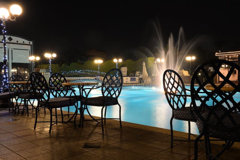 Hotel Swimming Pool at Night Stock Image - Image of illuminating ...