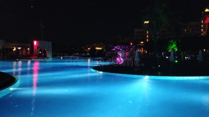 Hotel Swimming Pool at Night Stock Photo - Image of resort, sunlight ...