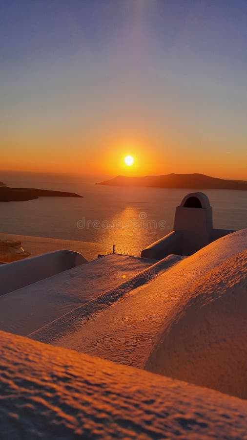 Sunsets over a Volcano stock image. Image of blue, water - 263920965