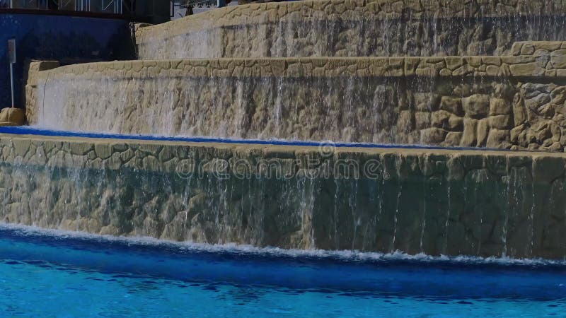 Pool Chairs Egypt, a Small Artificial Waterfall on Site Stock Video ...