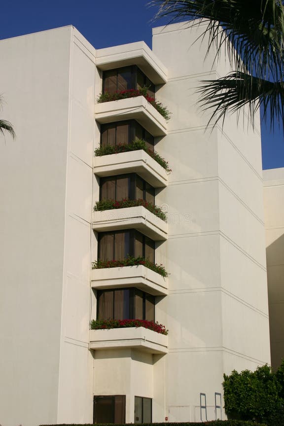 Hotel windows stock photo. Image of plant, building, tree - 817338