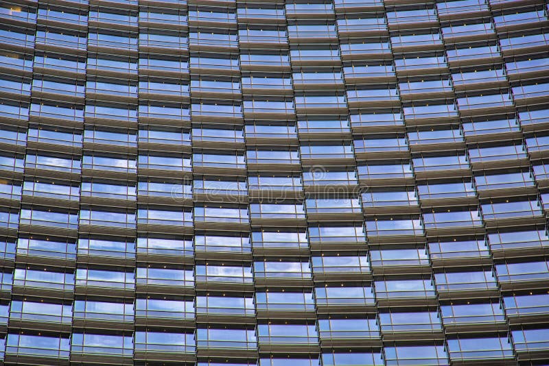 Hotel windows on a sunset stock image. Image of condo - 64605311