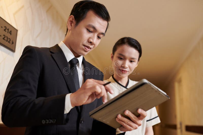 Hotel Workers Planning Work Stock Image - Image of staff, check: 282126433