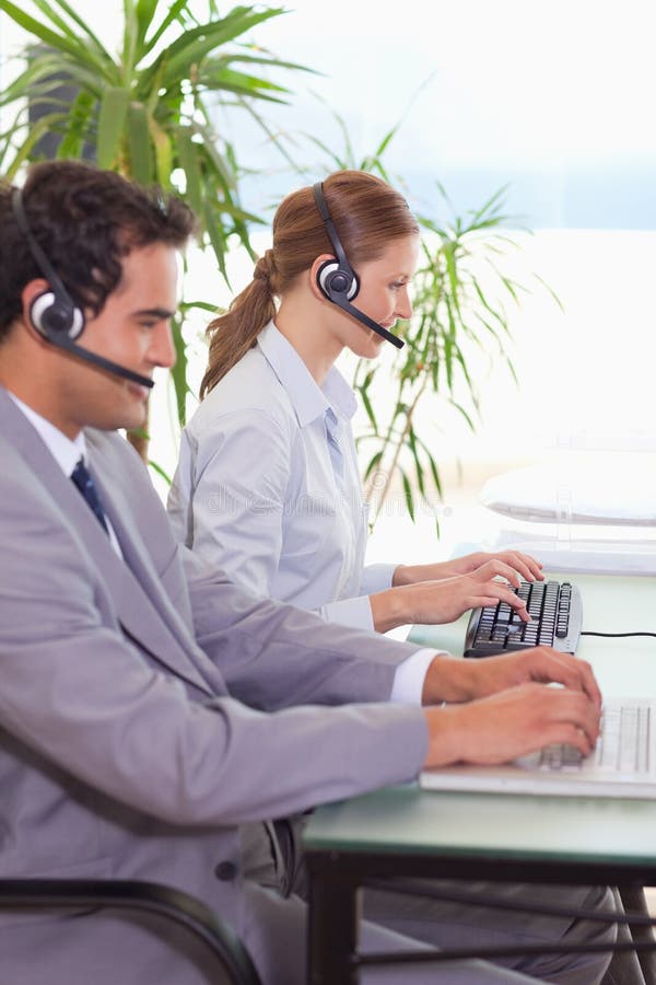 Hotline employees at work stock image. Image of helpdesk - 22221637