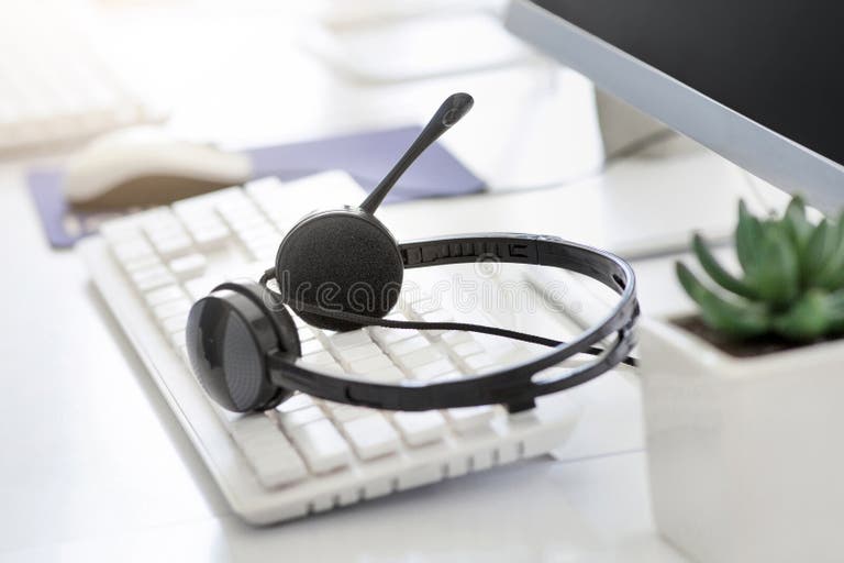 Hotline Operator S Desk with Computer Keyboard and Modern Headset at ...