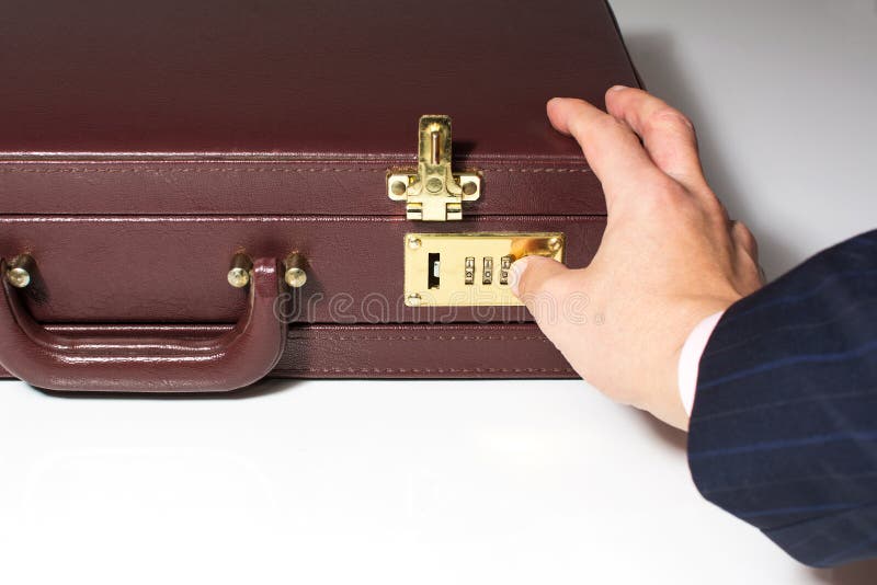 24-hour Briefcase with Hand that Releases the Lock Stock Photo - Image ...