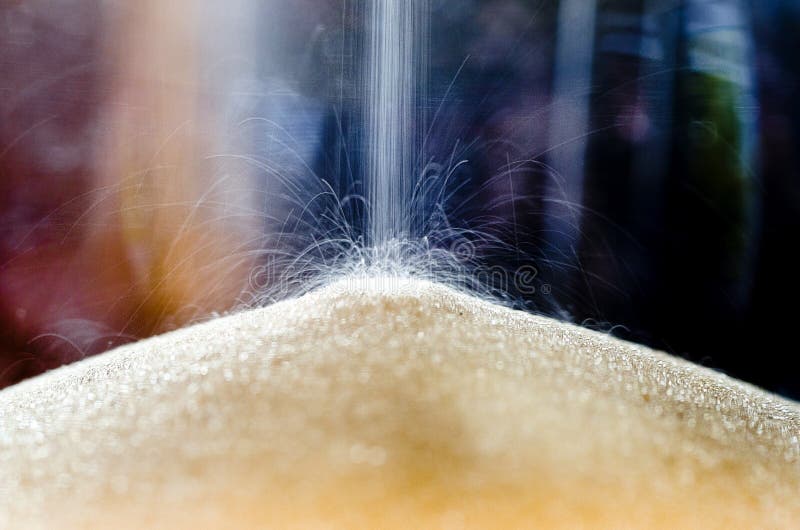 Close-up of Sand Falling in an Hour Glass Stock Photo - Image of ...