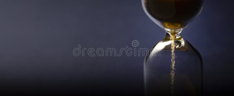 Hour Glass with Running Sand Inside, on Blue Background. Time Passing ...