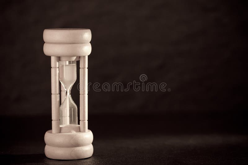 Tea cup and hourglass stock photo. Image of flowing, hour - 31437088