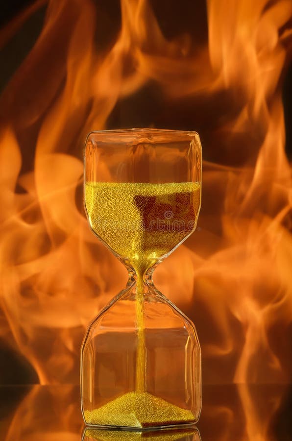 Hourglass on the Background of the Raging Flame Stock Image - Image of ...