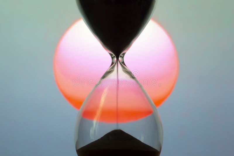 Hourglass on the Background of a Sunset. the Value of Time in Life ...