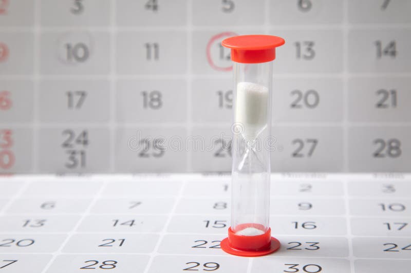 Hourglass and Calendar. Time Running Out Stock Image - Image of flowing ...