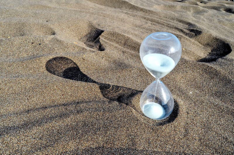 Hourglass Clock on the Sand Beach Stock Image - Image of love, visiting ...