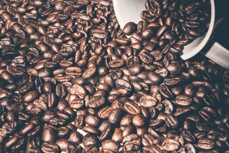 Hourglass in coffee beans stock photo. Image of food - 38889004