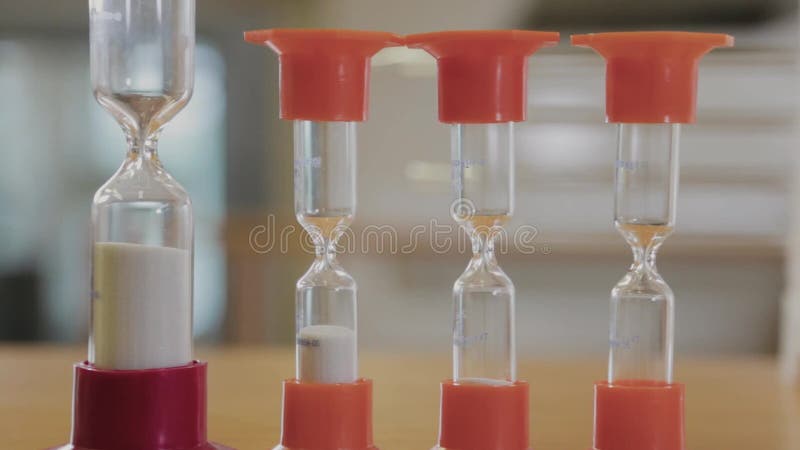 Hourglass of Different Sizes in a Science Laboratory. Stock Video ...