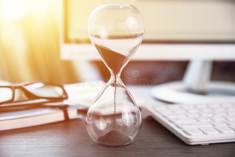 Hourglass with keyboard stock photo. Image of office - 195065648