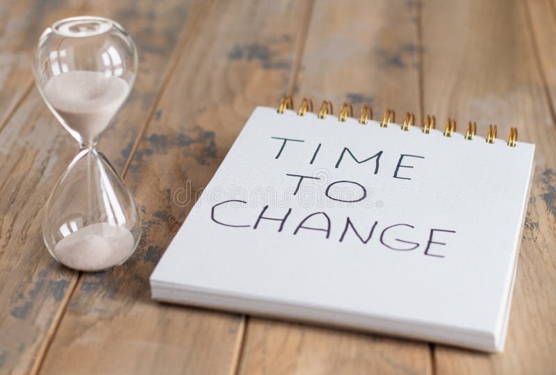 Hourglass and Notepad with Motivational Inscription - Time To Change ...