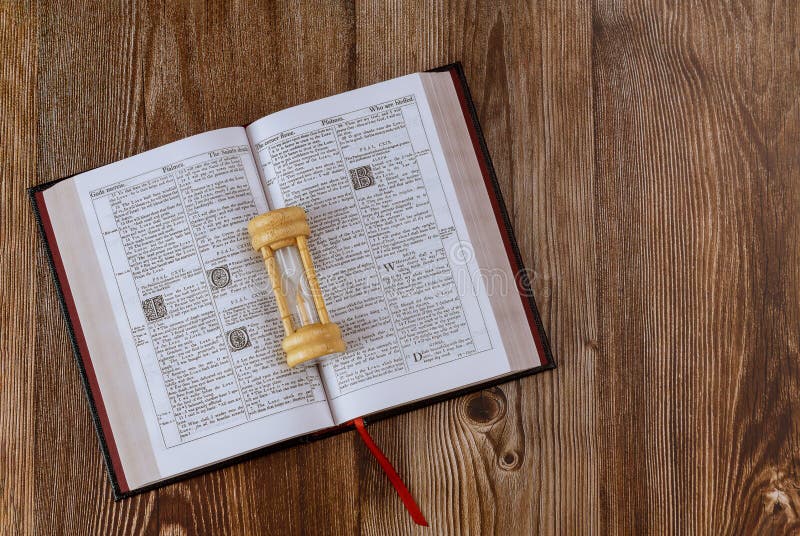 Hourglass and Open Bible Symbolizing the End Times According To the ... Hourglass and Open Bible Symbolizing the End Times According To the ...