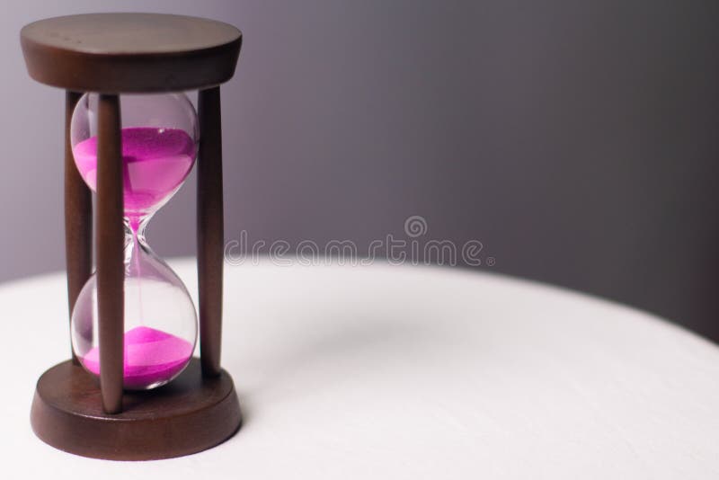 Modern Hour Glass on Pink stock photo. Image of studio - 14310096