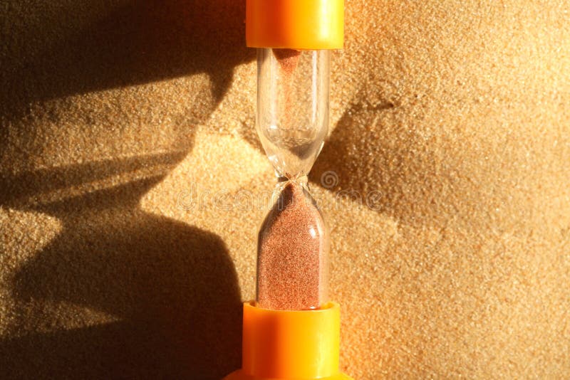Hourglass on Sand stock photo. Image of time, conceptual - 25005154