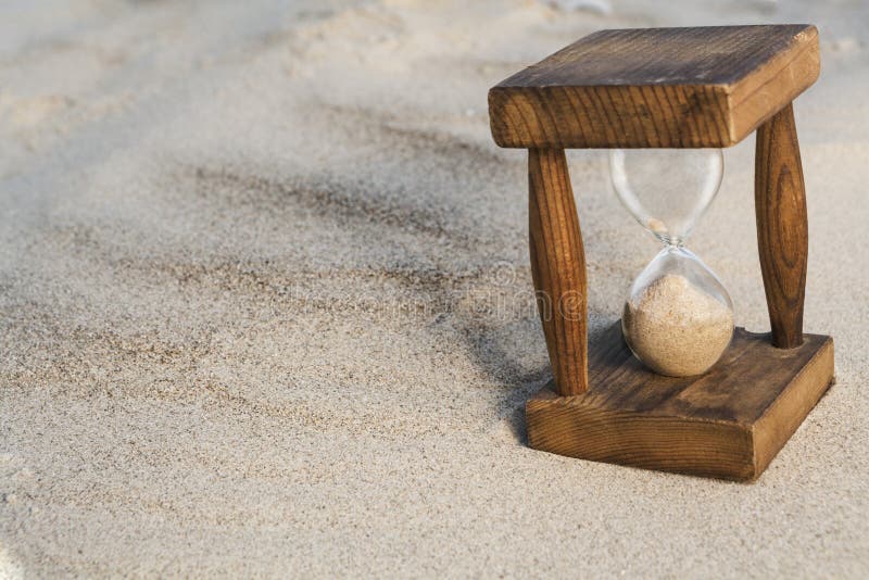 Sand Running through the Hourglass. Time Keeper Concept. Stock Photo ...
