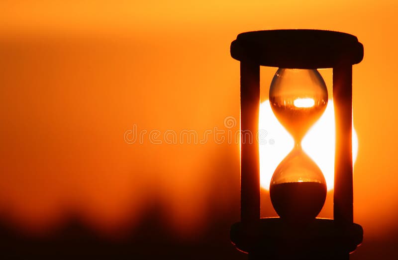 Hourglass in sunset stock photo. Image of glass, pass - 1812922