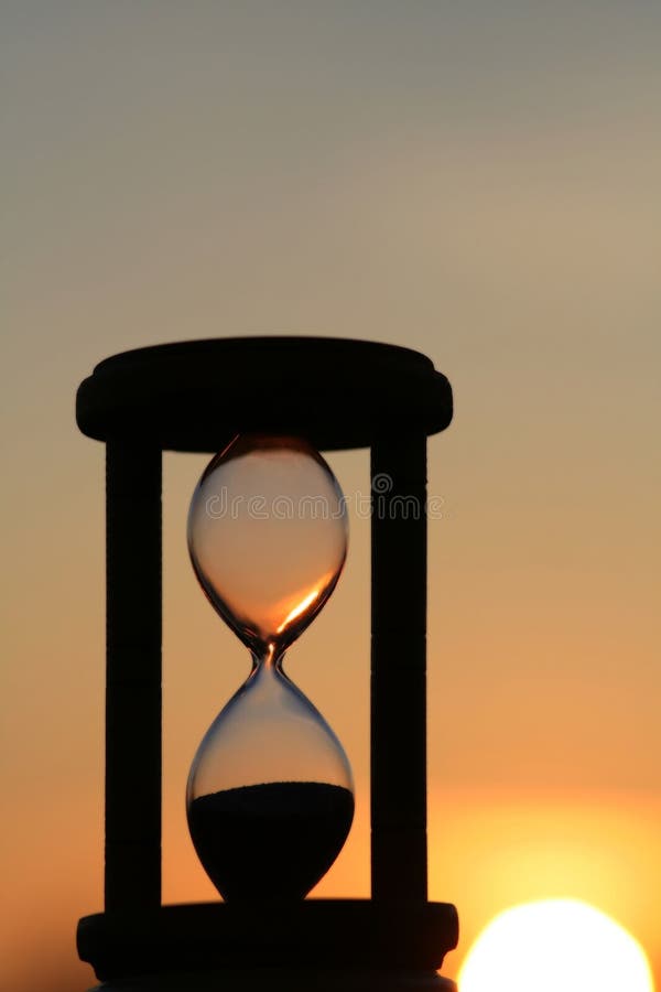 Hourglass in sunset stock photo. Image of glass, pass - 1812922