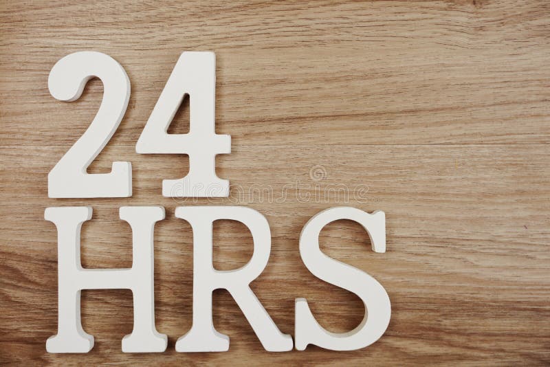 24 Hours Alphabet Letters Top View on Wooden Background Stock Photo ...