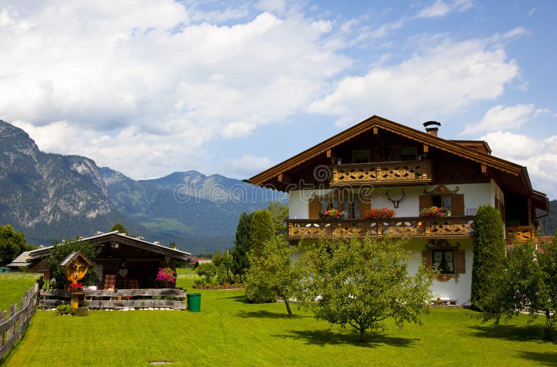 Austrian houses stock image. Image of property, hill, flowers - 1123623