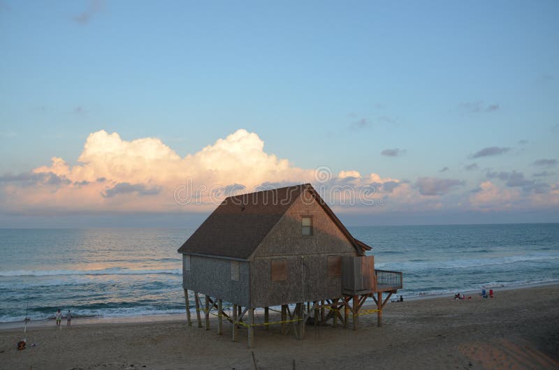 House along the shore stock photo. Image of shore, clouds - 50955674