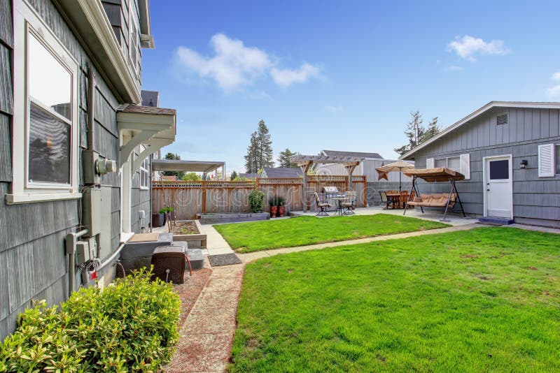 House Backyard with Patio Area Stock Image - Image of landscape ...