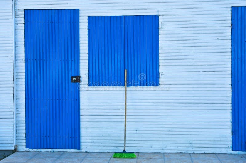 House with Blue Doors and Shutters Stock Image - Image of fasade, blue ...