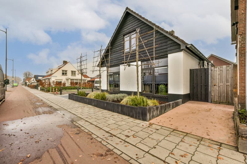 A House with a Brick Sidewalk in Front of it Editorial Image - Image of ...