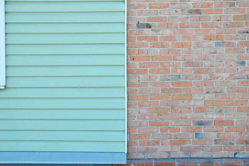 House Brick Wall Texture Background and Half with Plastic Siding Wall ...