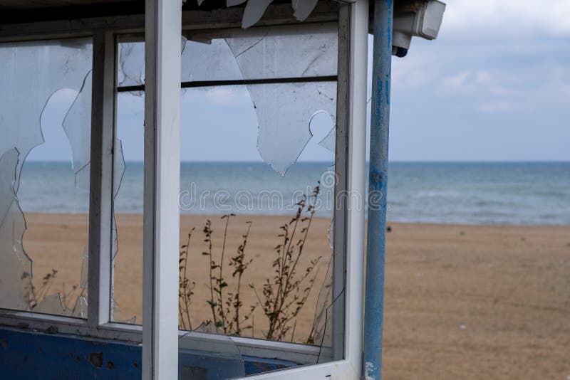 House with Broken Windows on the Empty Beach Stock Image - Image of ...