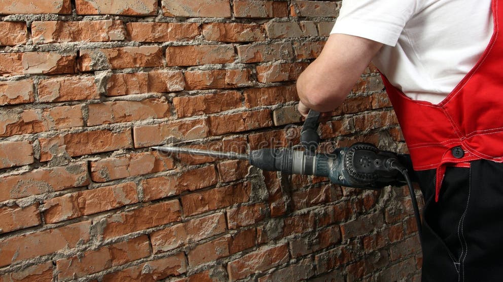 House-builder in Uniform Working with a Plugger Stock Image - Image of ...