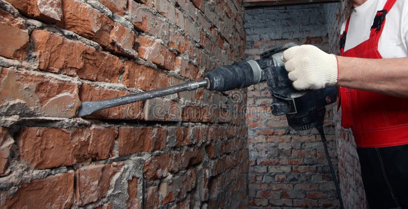 House-builder in Uniform Working with a Plugger Stock Photo - Image of ...