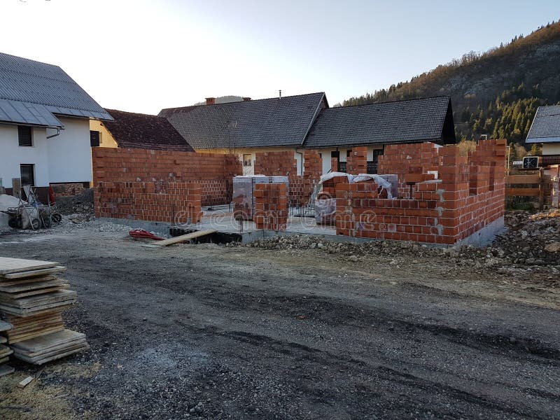 House building in progress stock photo. Image of architecture - 135643344