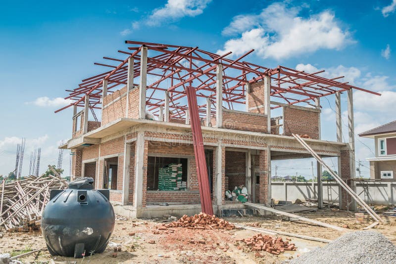 House Building Structure at Construction Site with Clouds Stock Photo ...