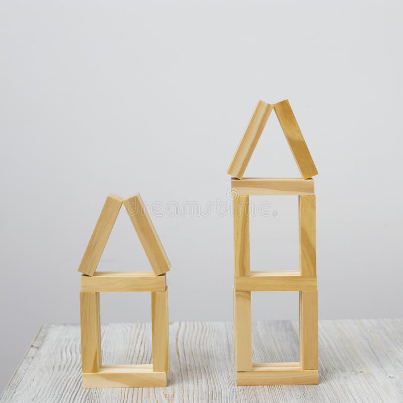A House Built of Blocks on a Wooden Table Stock Photo - Image of ...