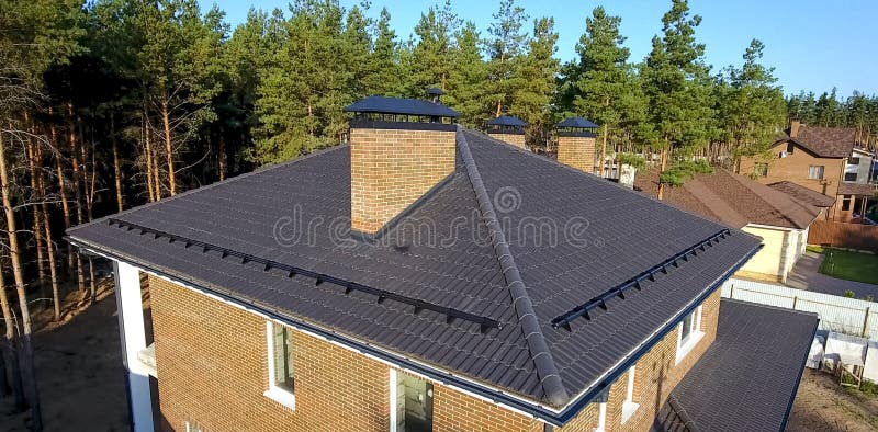 House with Ceramic Tile Roof. Cement-sand Roof Tiles Stock Image ...