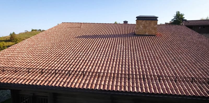 House with Ceramic Tile Roof. Cement-sand Roof Tiles Stock Photo ...