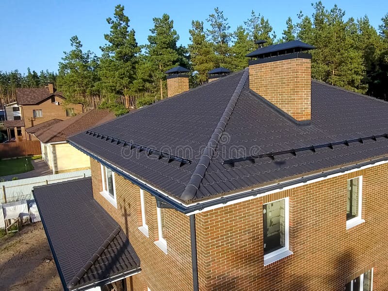 House with Ceramic Tile Roof. Cement-sand Roof Tiles Stock Image ...