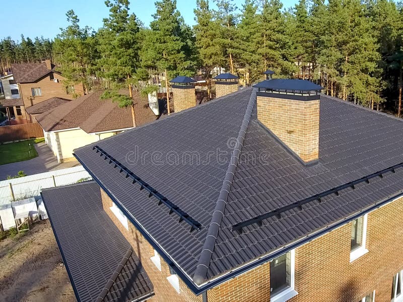 House with Ceramic Tile Roof. Cement-sand Roof Tiles Stock Photo ...