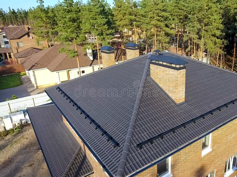 House with Ceramic Tile Roof. Cement-sand Roof Tiles Stock Photo ...